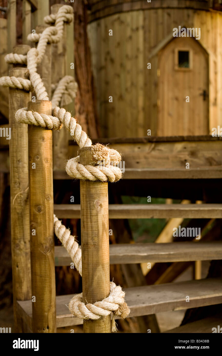 Steps up to the entrance of an ornate treehouse in Northumberland ...