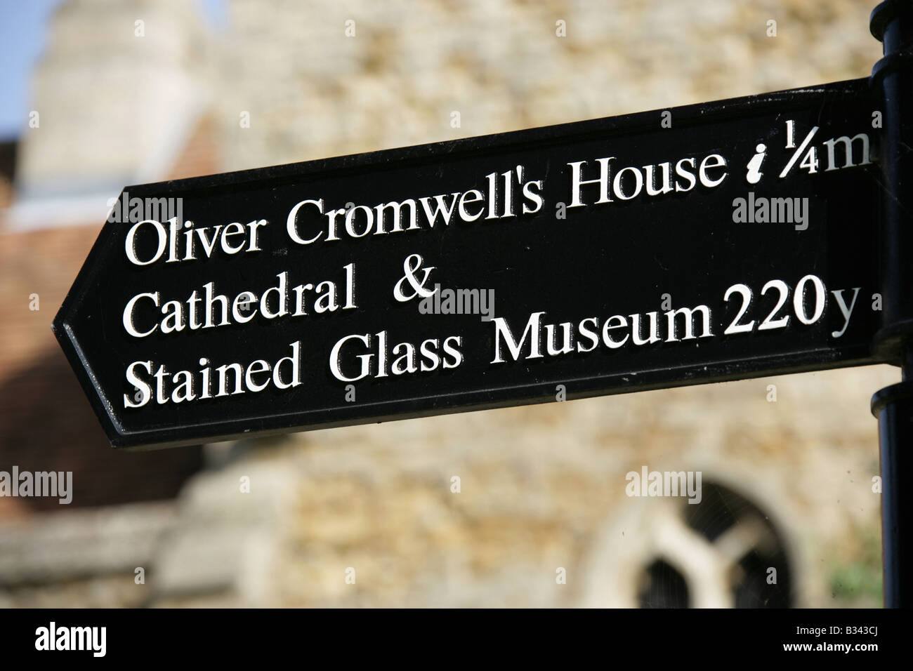 City of Ely, England. Tourist direction sign near Ely Cathedral with ...