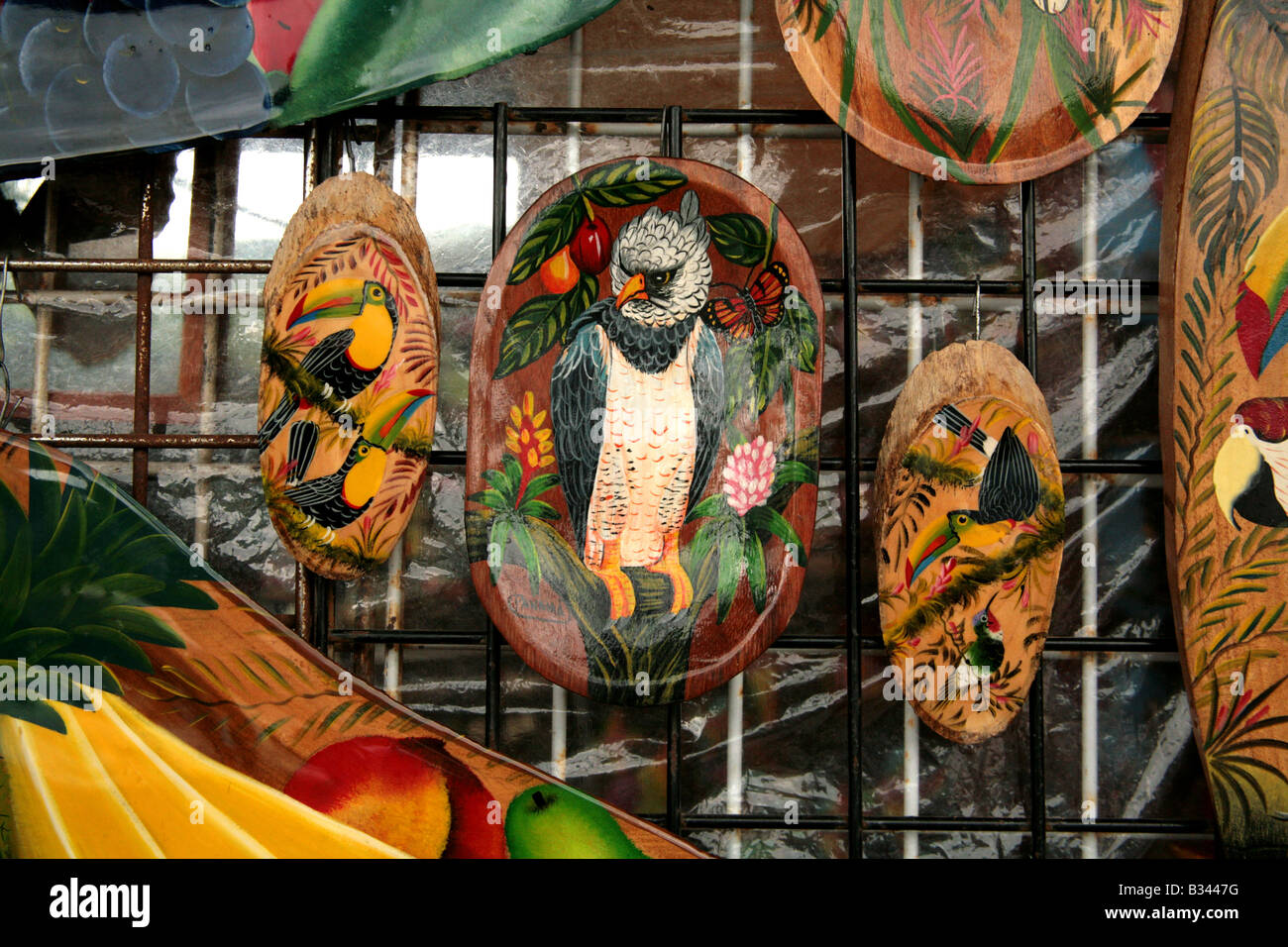 Wood carved crafts hand made and painted on sale in a rural market at ...