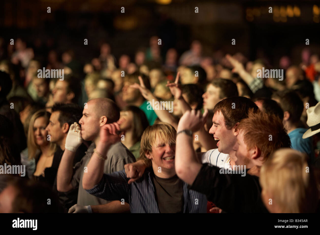 People singing in crowd hi-res stock photography and images - Alamy