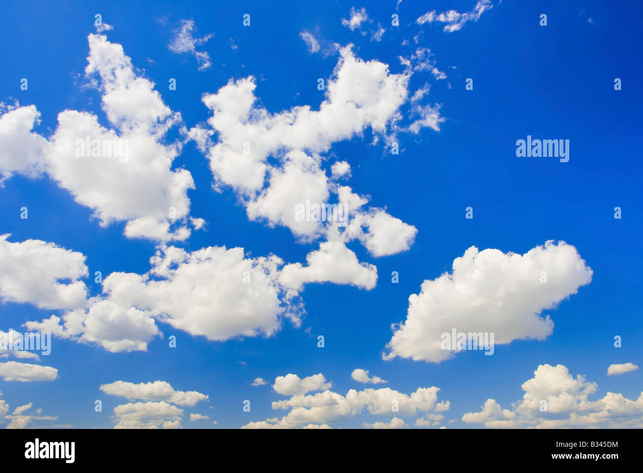 Picture of a beautiful blue sky with scattered clouds Stock Photo - Alamy