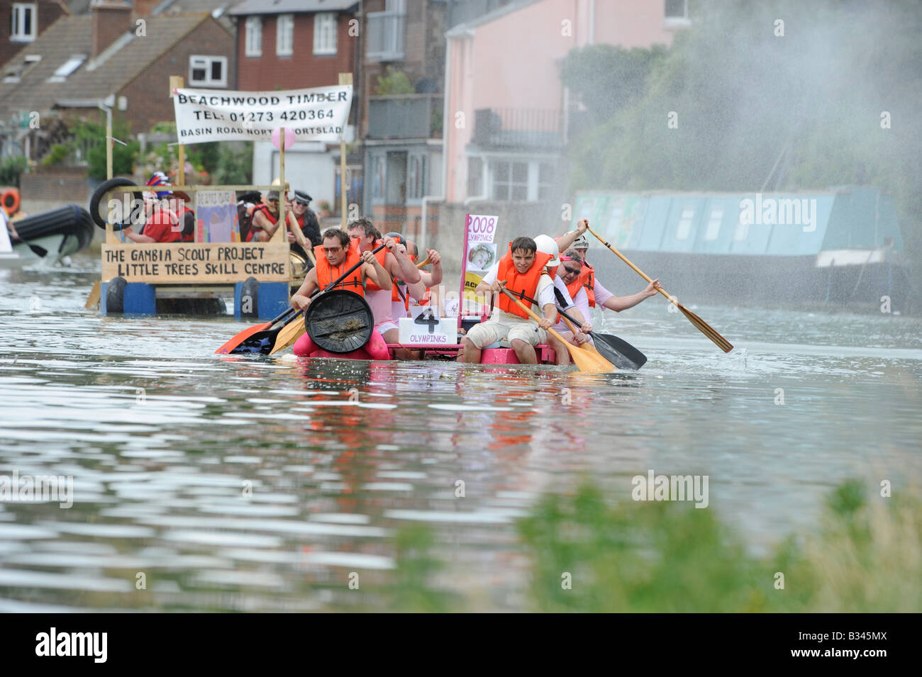 Lewes Raft Race 2008: competitors race down the river on the falling ...