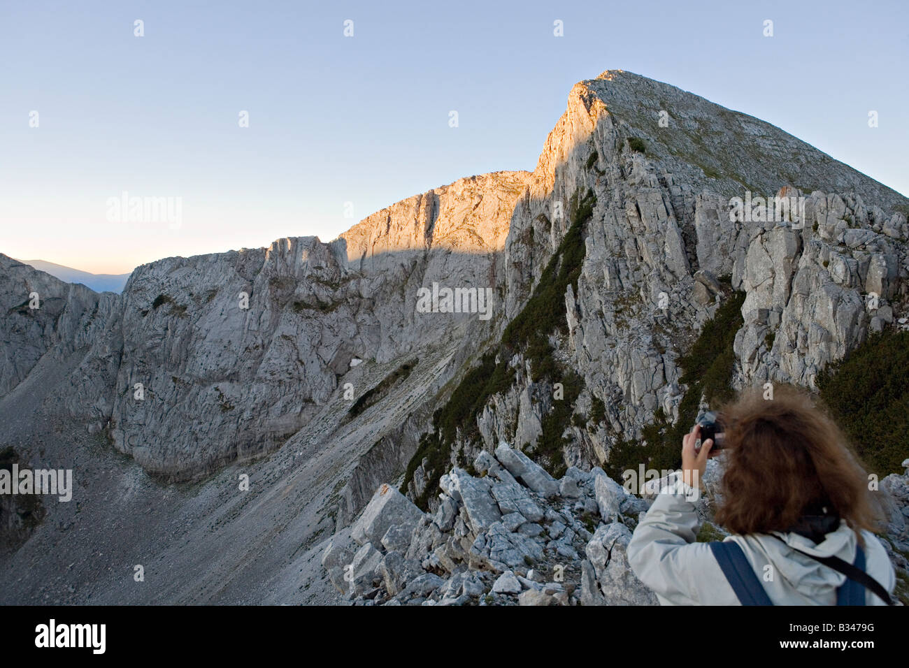 Ascending Sinanitsa peak at dawn in World Heritage Site Pirin National ...