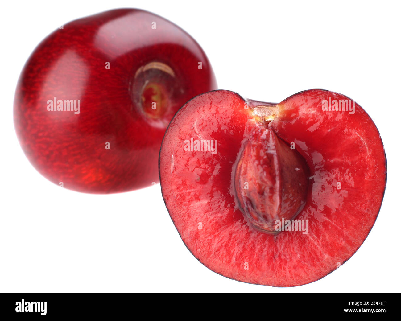 Red cherry closeup isolated on white background Stock Photo - Alamy