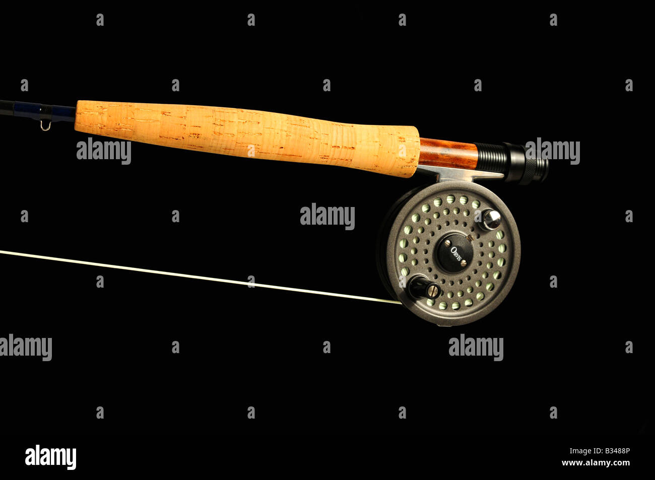 Fly fishing rod and reel Stock Photo - Alamy