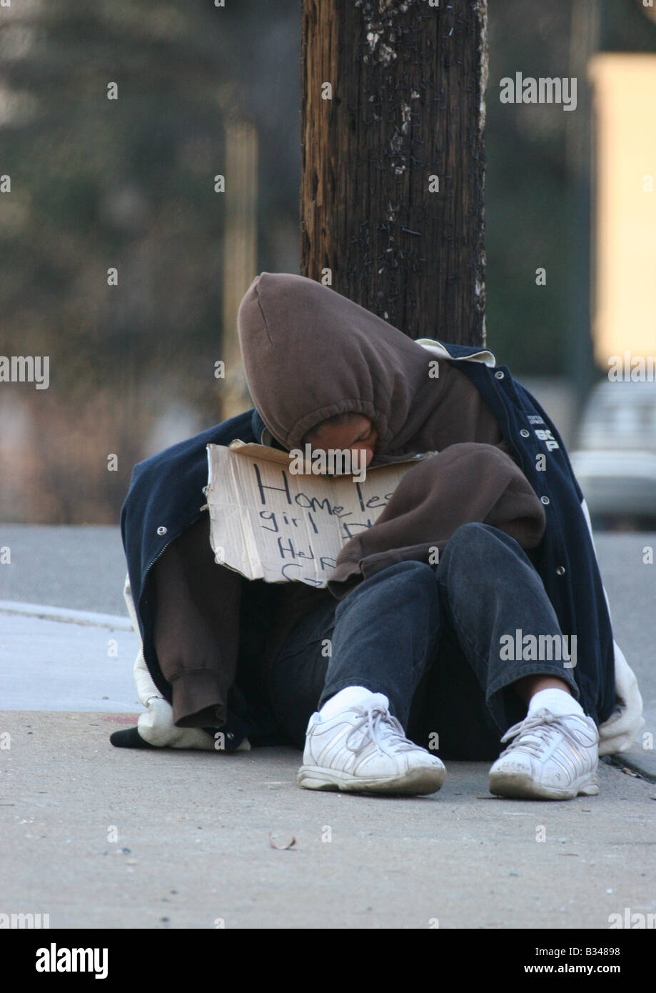 Homeless girl begging in street hi-res stock photography and images - Alamy