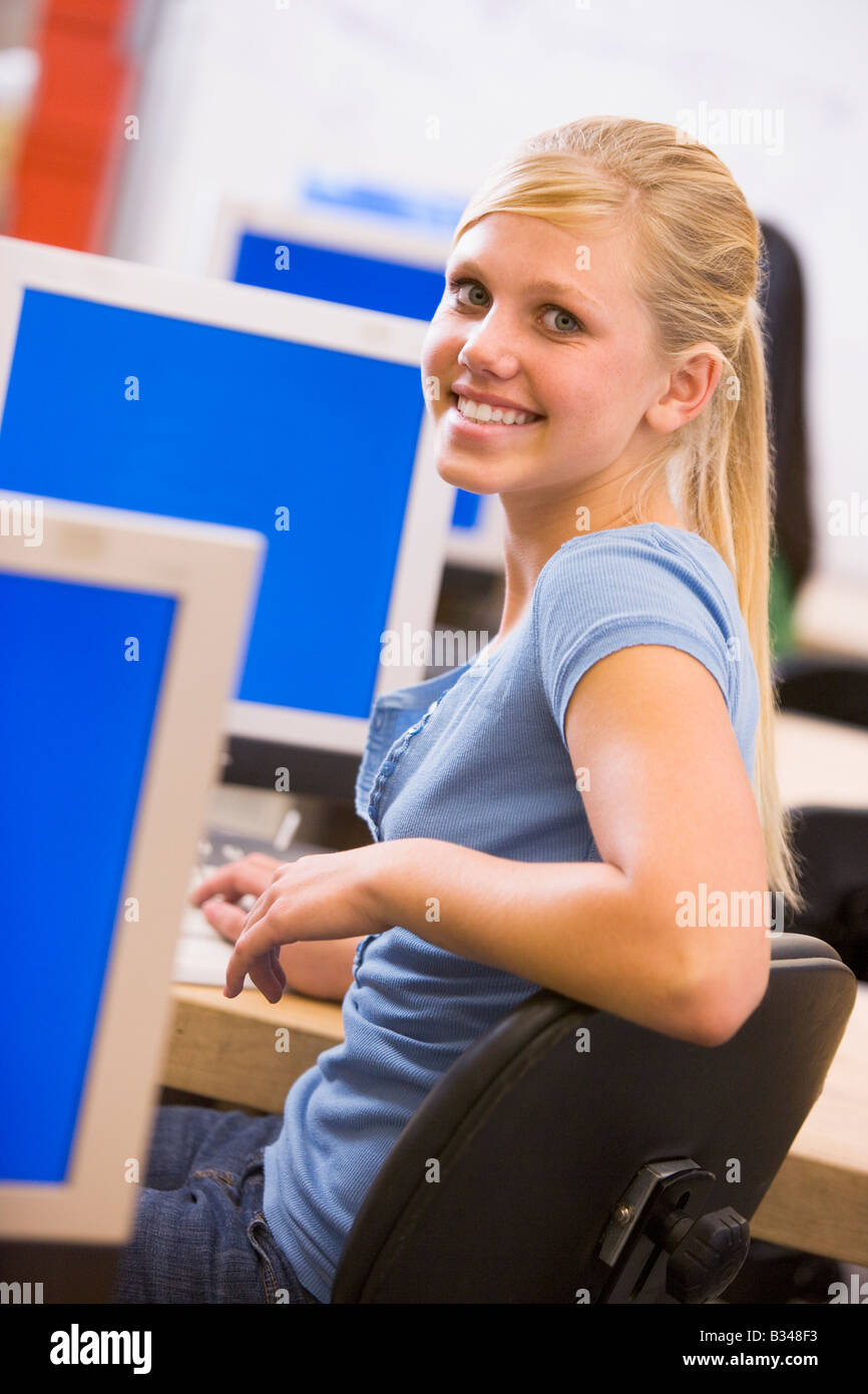 Female student in computer class Stock Photo - Alamy