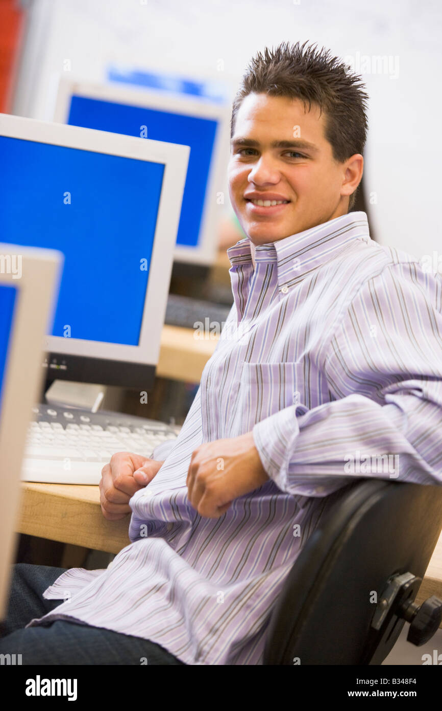Male student in computer class Stock Photo - Alamy