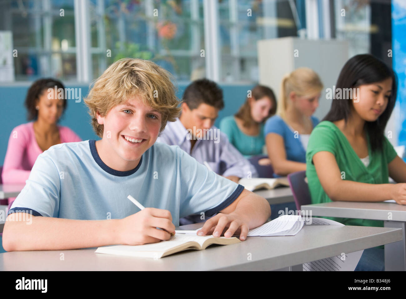Students studying in geography class Stock Photo - Alamy