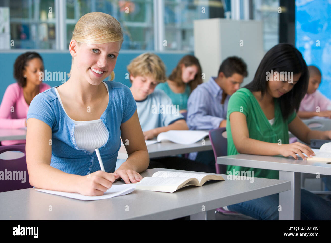 Students studying in geography class Stock Photo - Alamy