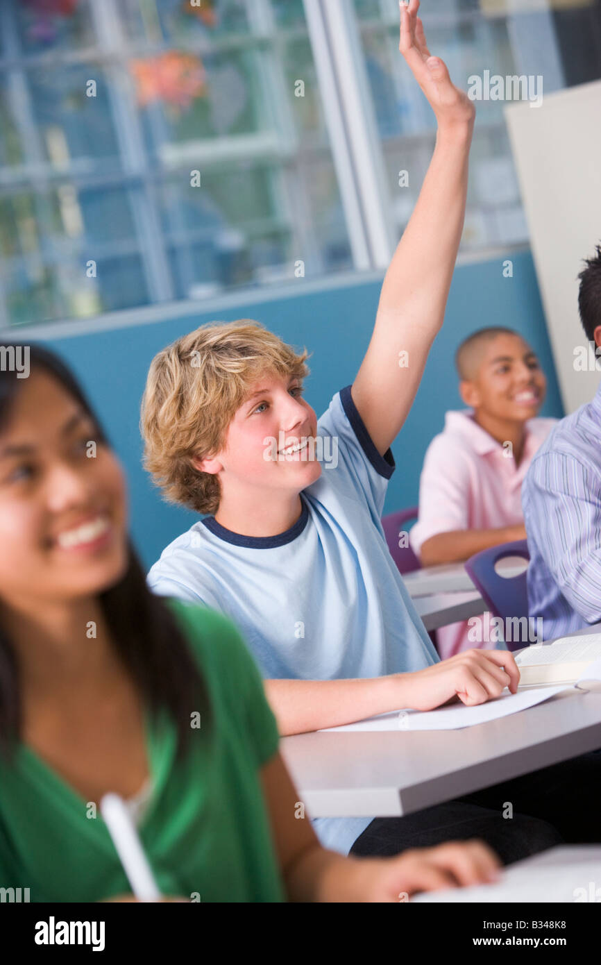 Students answering questions in geography class Stock Photo - Alamy