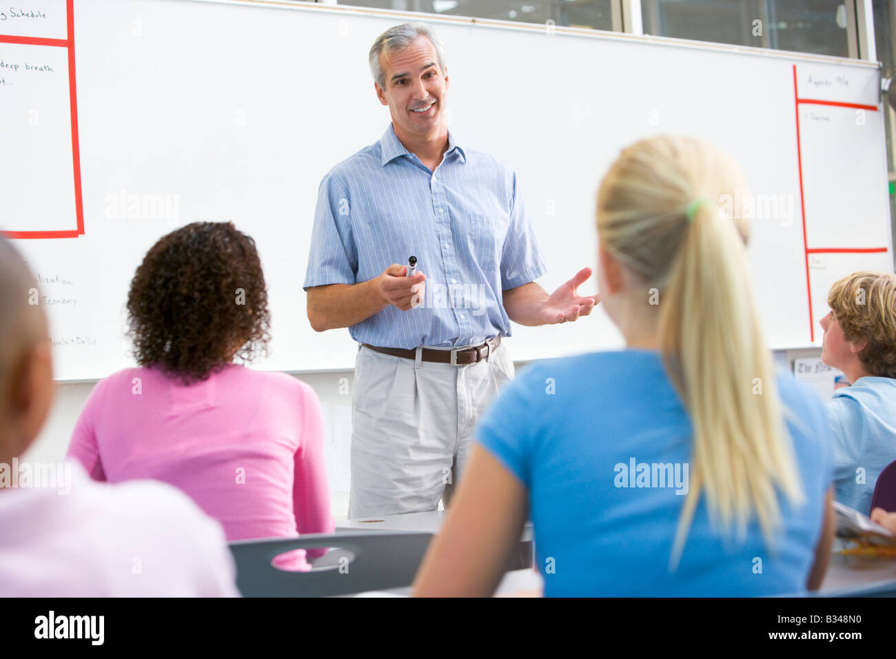 Students in math class with teacher Stock Photo - Alamy