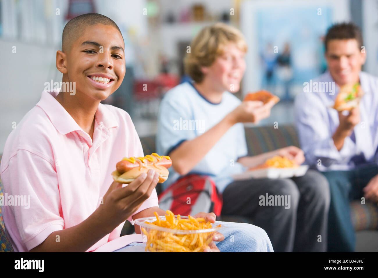 Students having lunch Stock Photo - Alamy