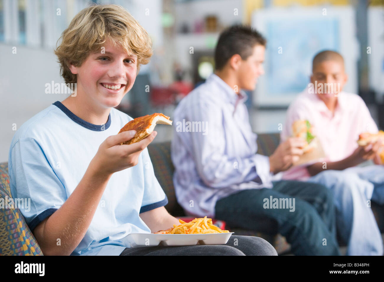 Students having lunch Stock Photo - Alamy
