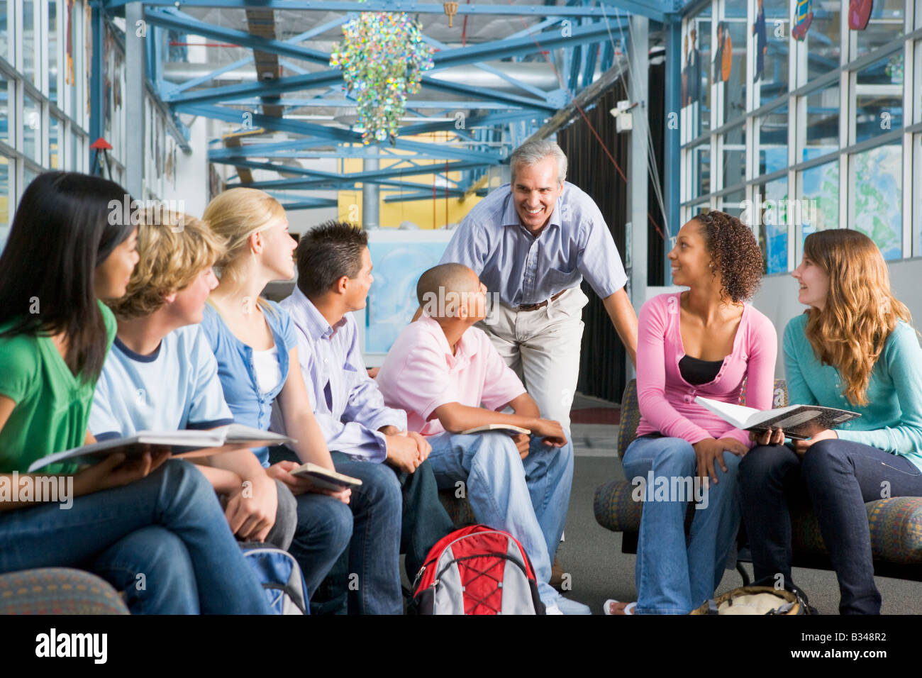 Students study group with teacher Stock Photo - Alamy