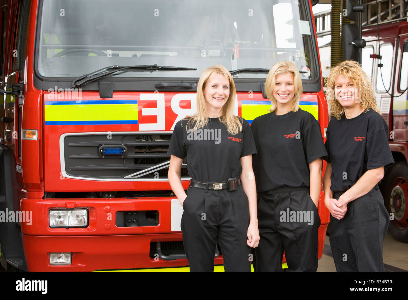 Three firefighters hi-res stock photography and images - Alamy