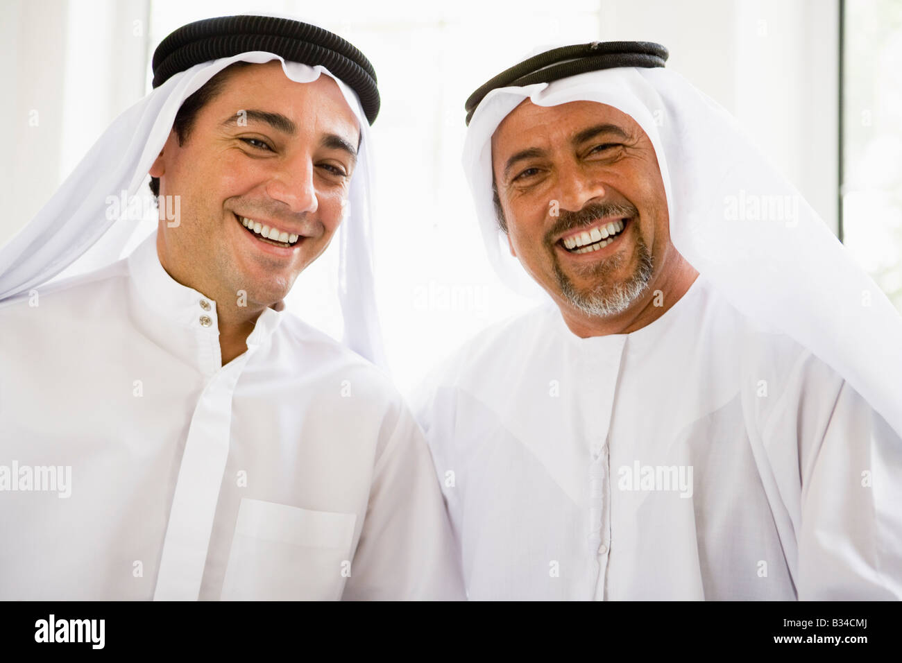 Two happy men sitting on hi-res stock photography and images - Alamy