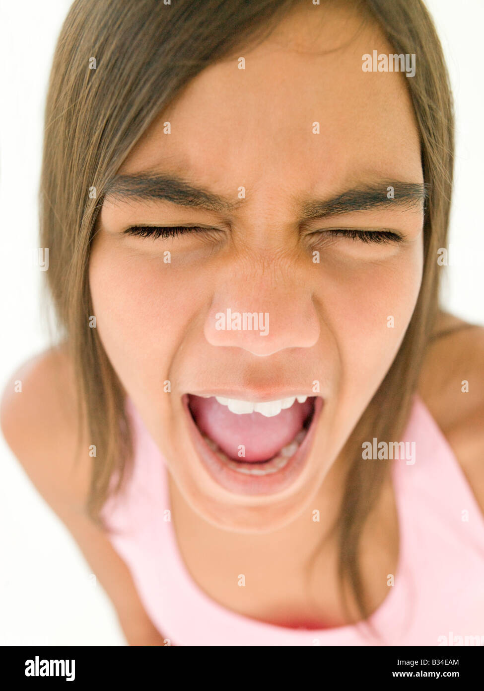 Young girl shouting Stock Photo - Alamy