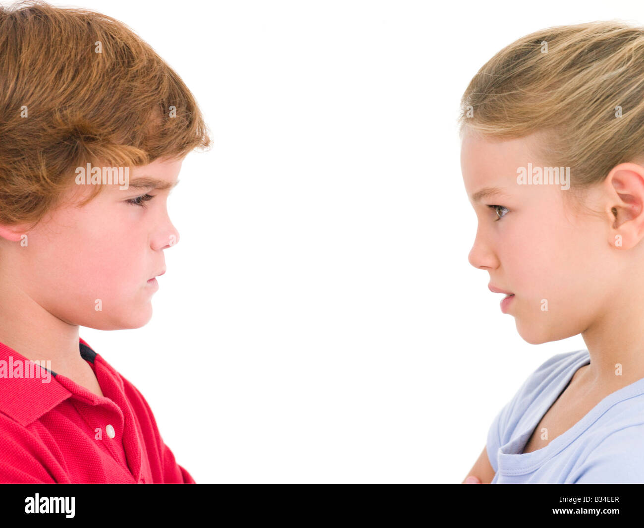 Brother and sister staring at each other Stock Photo - Alamy