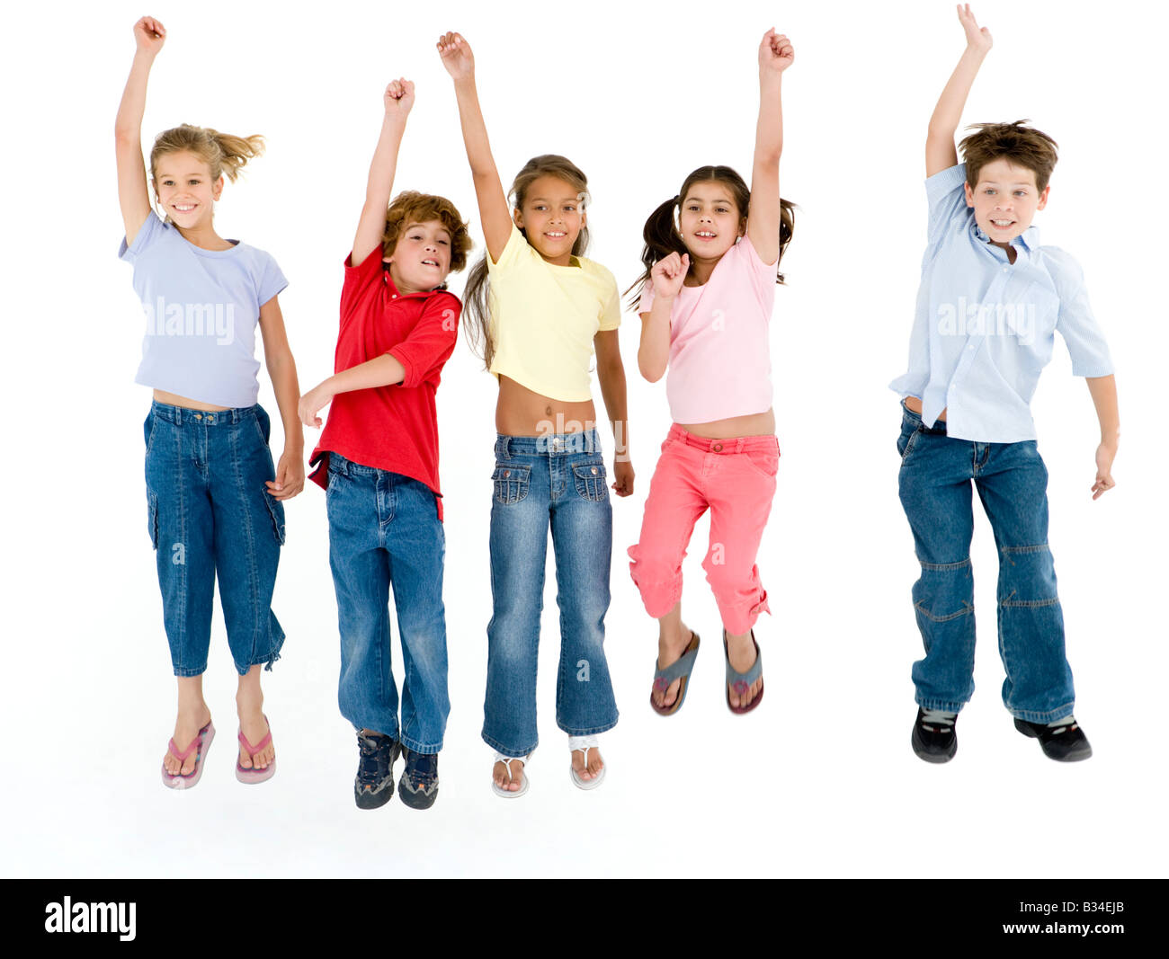 Group five happy kids jumping hi-res stock photography and images - Alamy