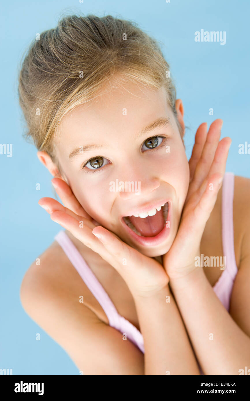Young girl excited and happy Stock Photo - Alamy
