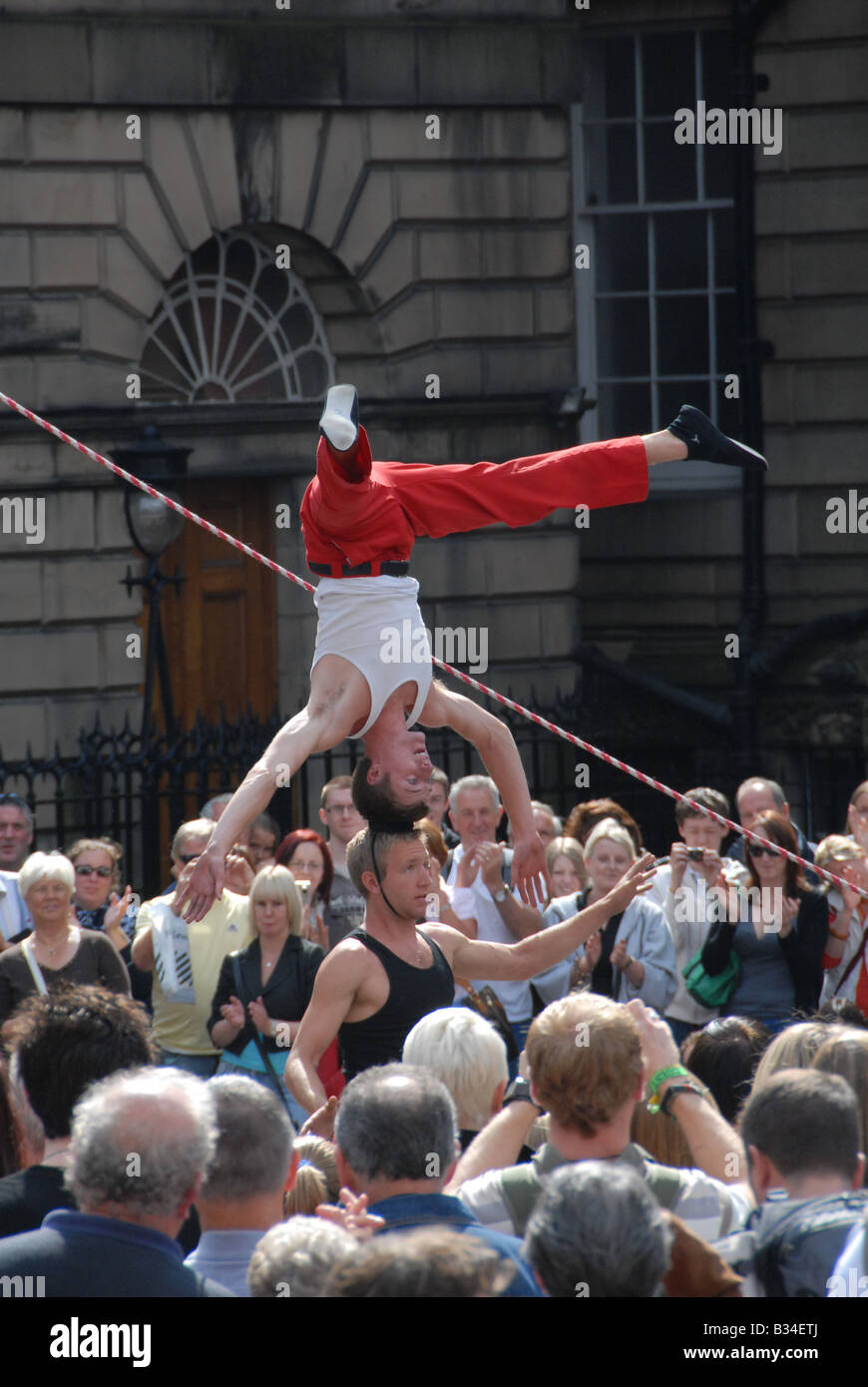 Acrobatic street performers Stock Photo - Alamy