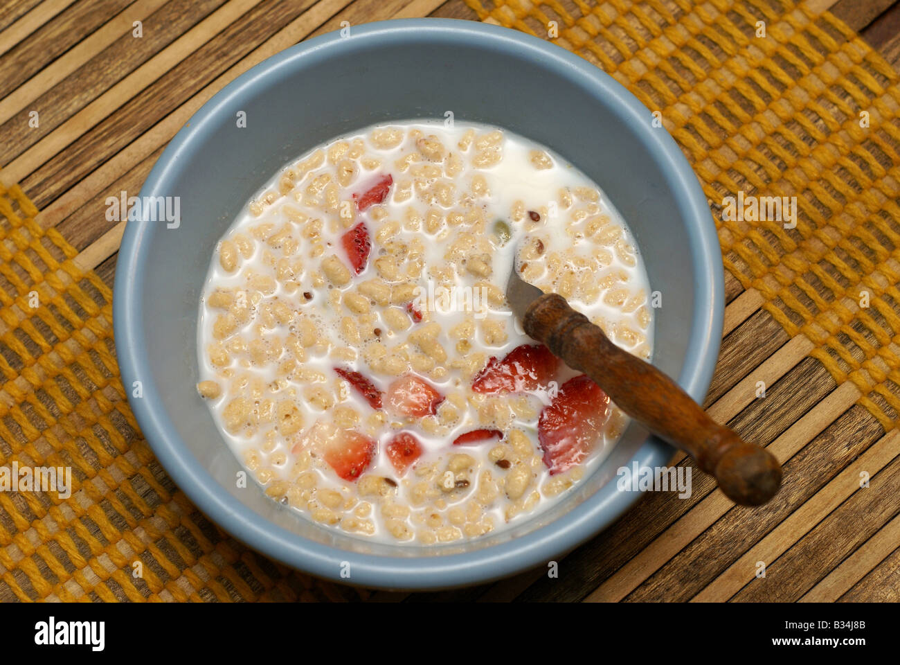 Cereal Floating In Milk Stock Photo - Alamy