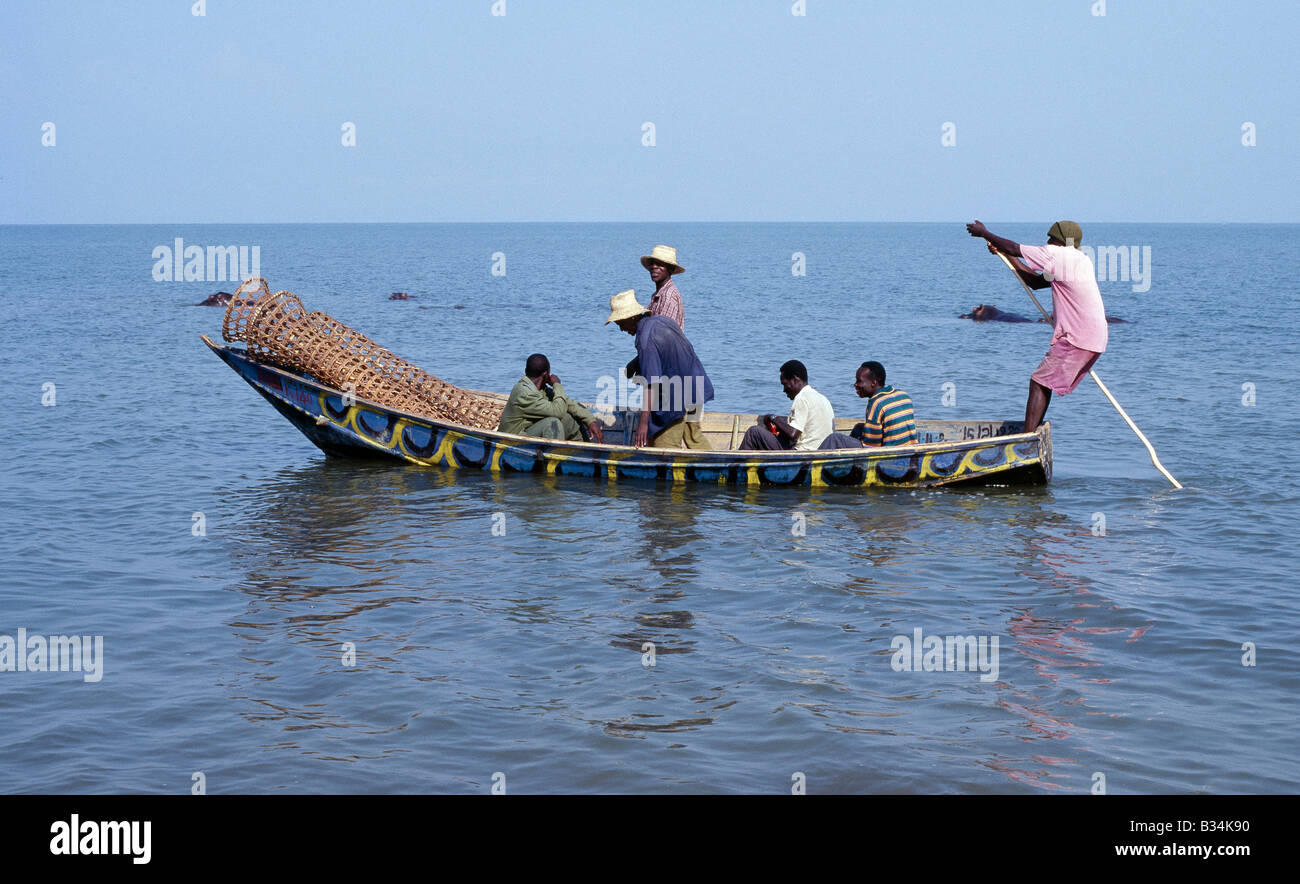 Uganda, Lake Edward, Rwenshama. A wooden fishing boat with fish traps ...