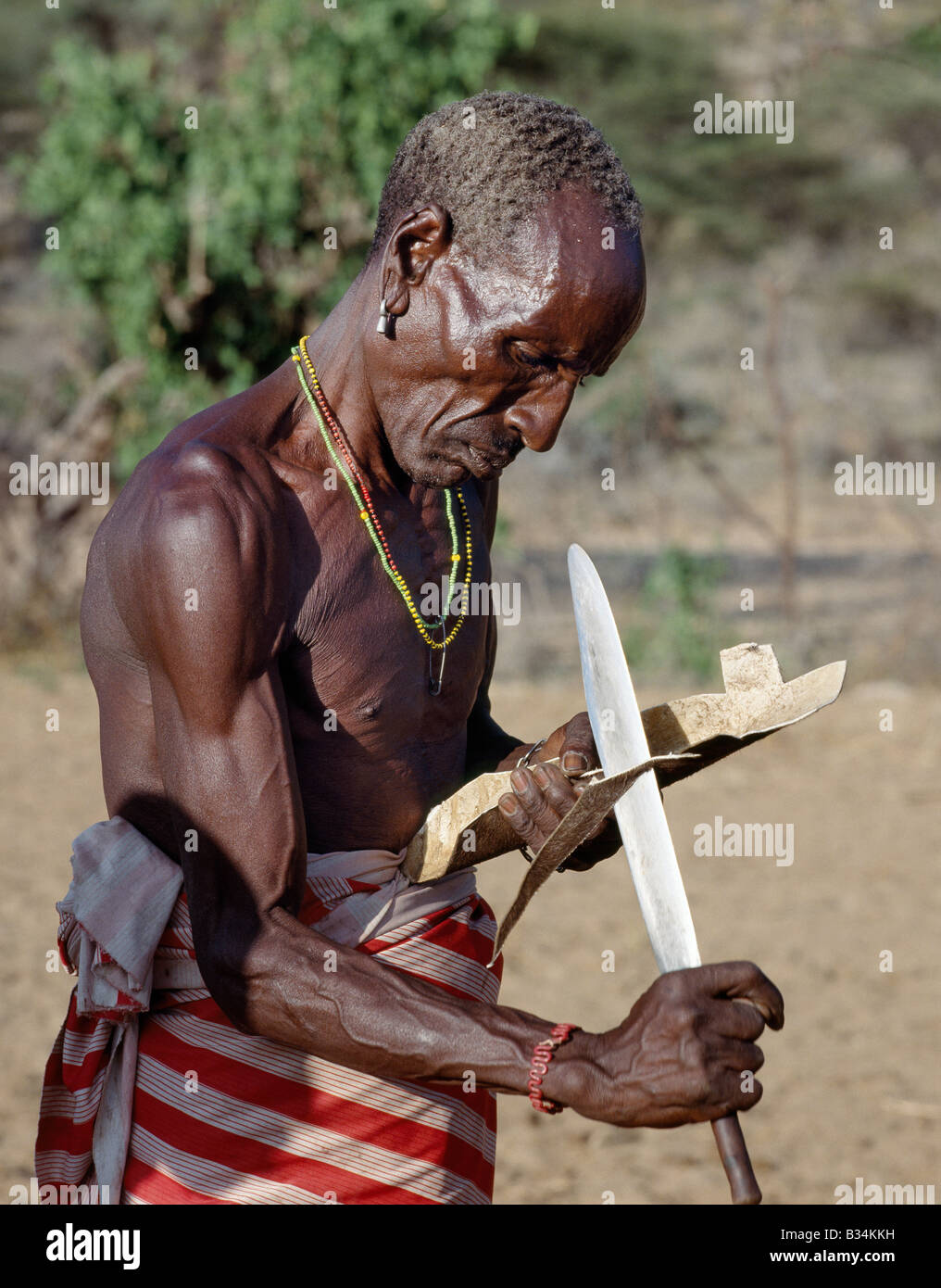 Kenya, Samburu District, South Horr. The ritual helpers of two Samburu ...