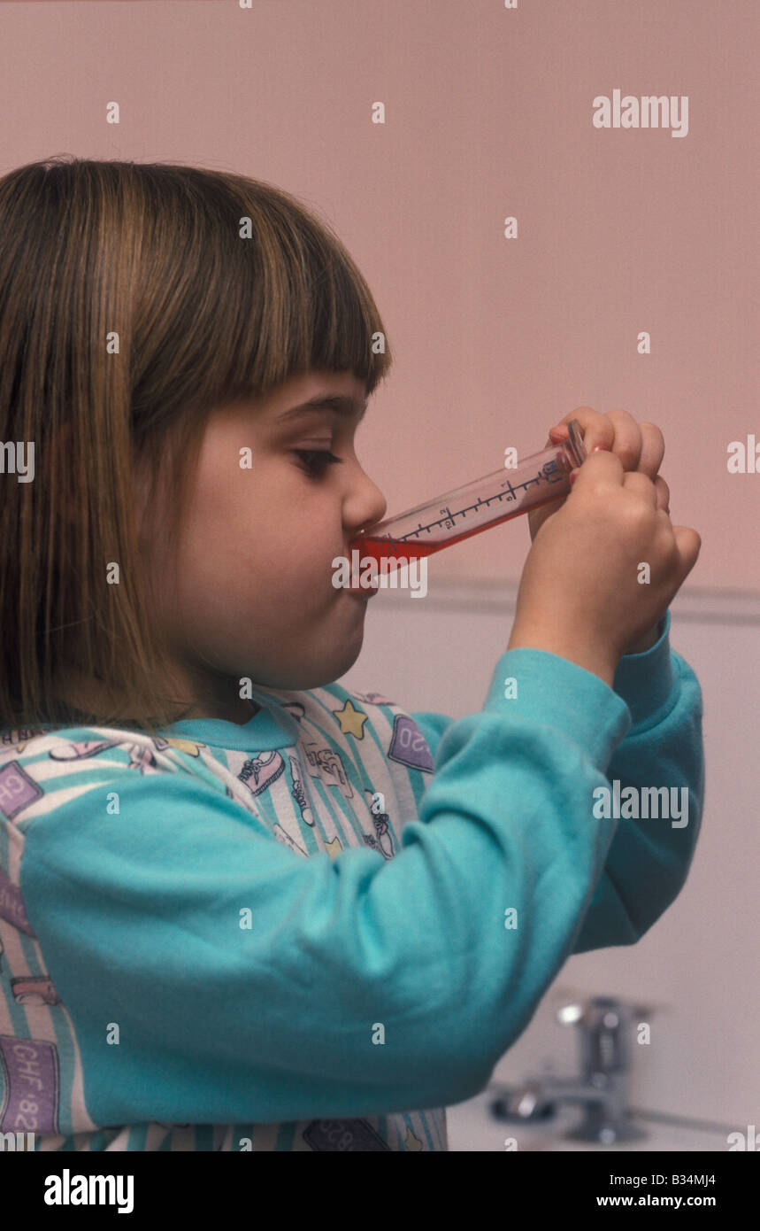 child taking medicine by syringe Stock Photo - Alamy