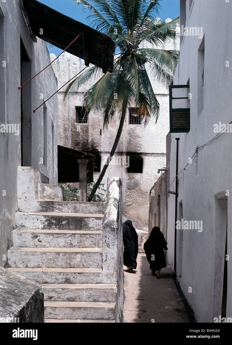 Kenya, Coast Province, Lamu. A narrow street in Lamu's historic island ...