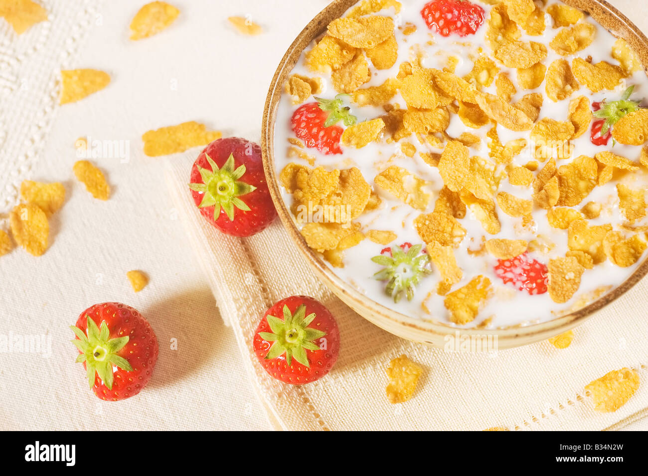 Healthy morning breakfast Bowl full of milk and cornflakes with fresh ...