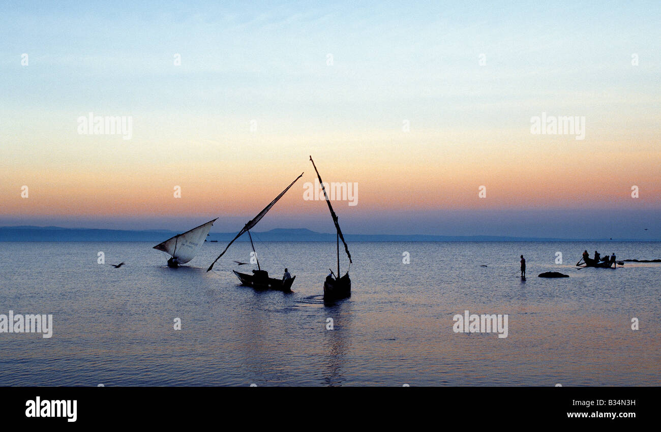 Kenya, Nyanza Province, Kisumu. At daybreak, fishermen leave Dunga ...