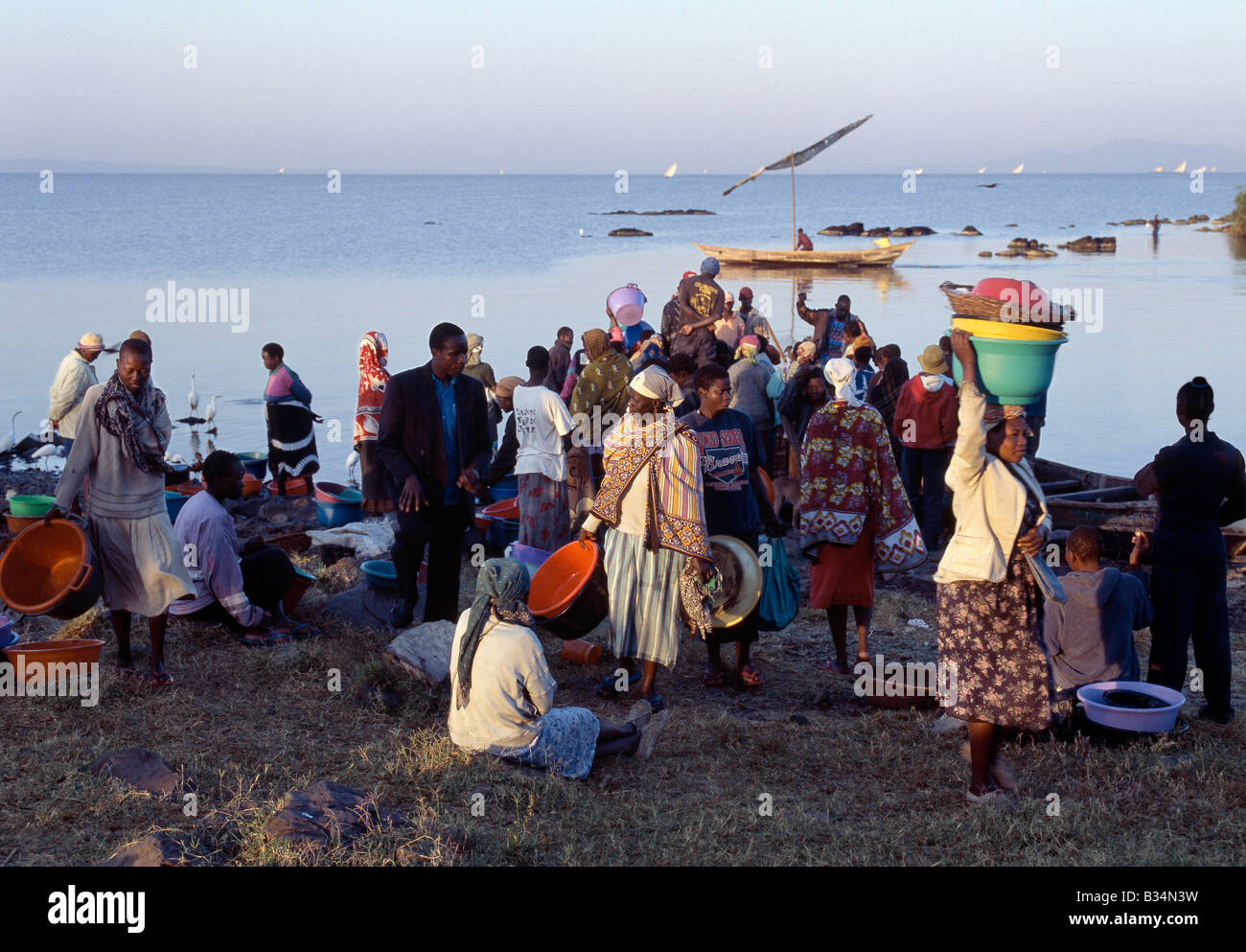 Kenya, Nyanza Province, Kisumu. Having fished all night in the shallow ...