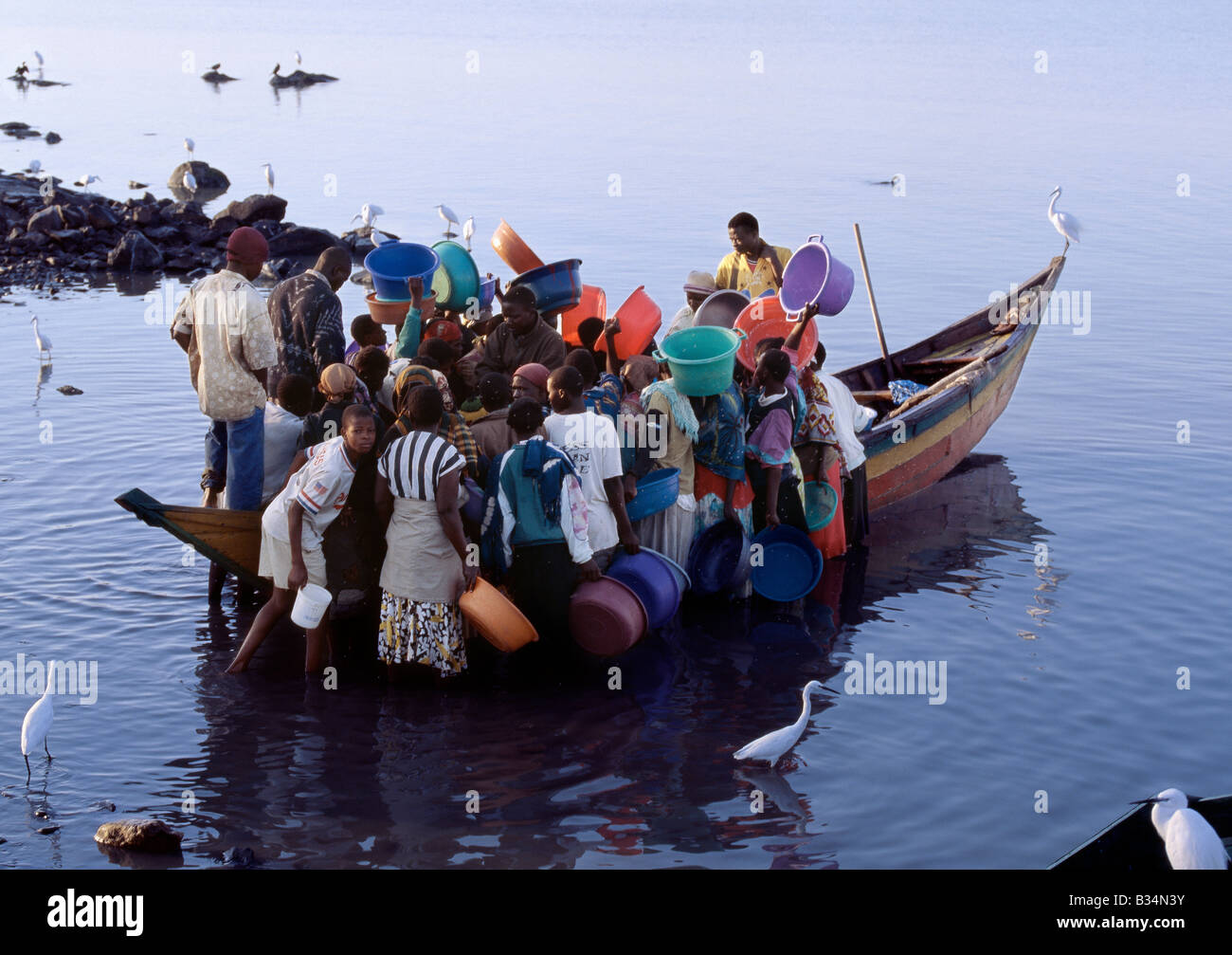 Kenya, Nyanza Province, Kisumu. Having fished all night in the shallow ...