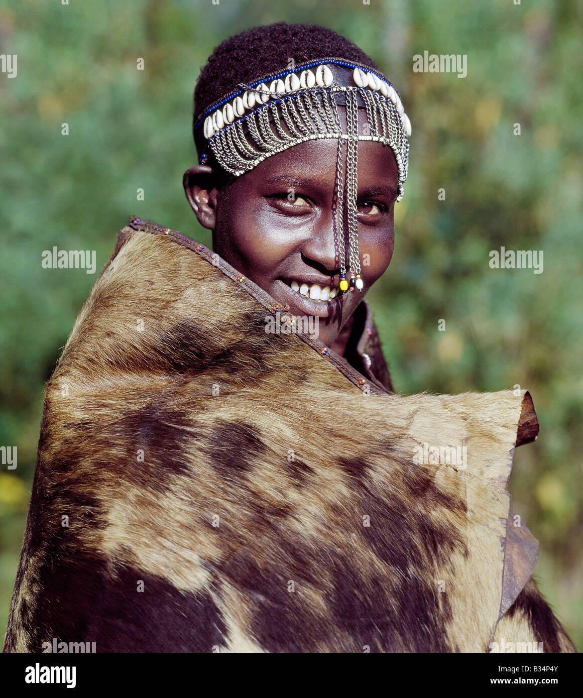 Kenya, Narok, Mau Forest. A girl from the Ogiek community of hunter ...
