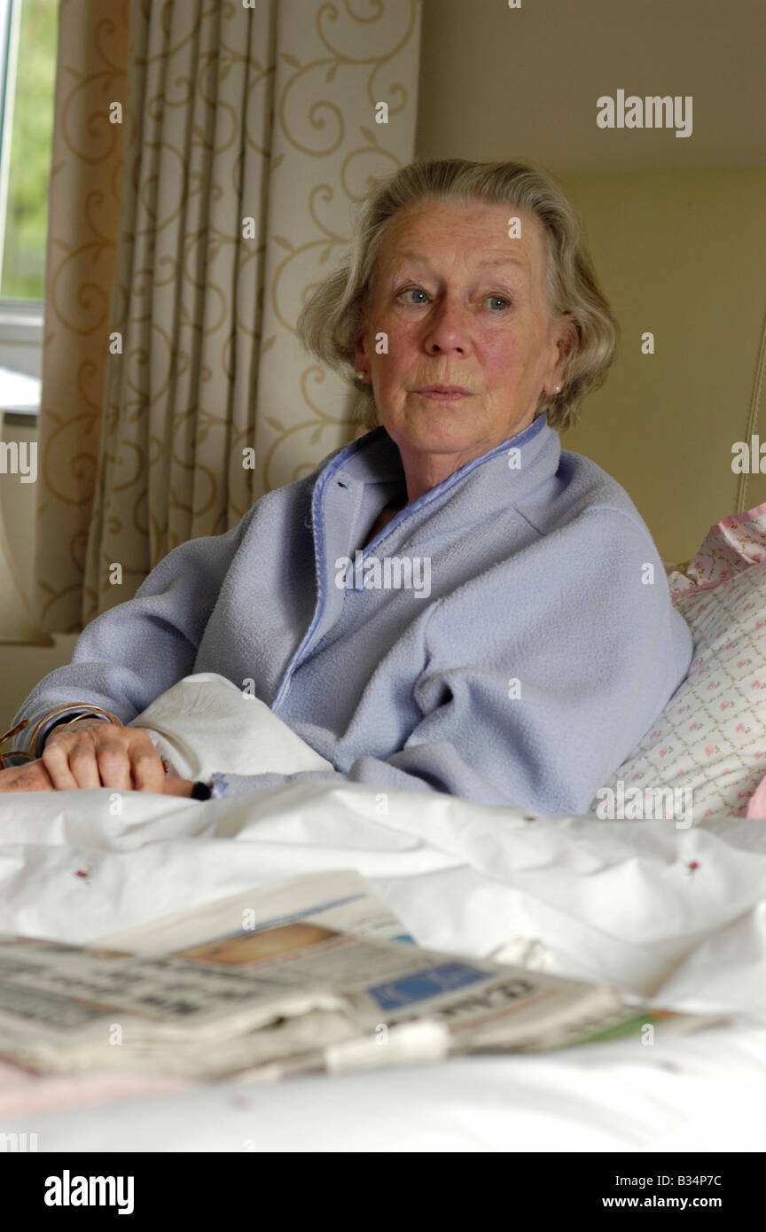 Confused elderly woman bed hi-res stock photography and images - Alamy