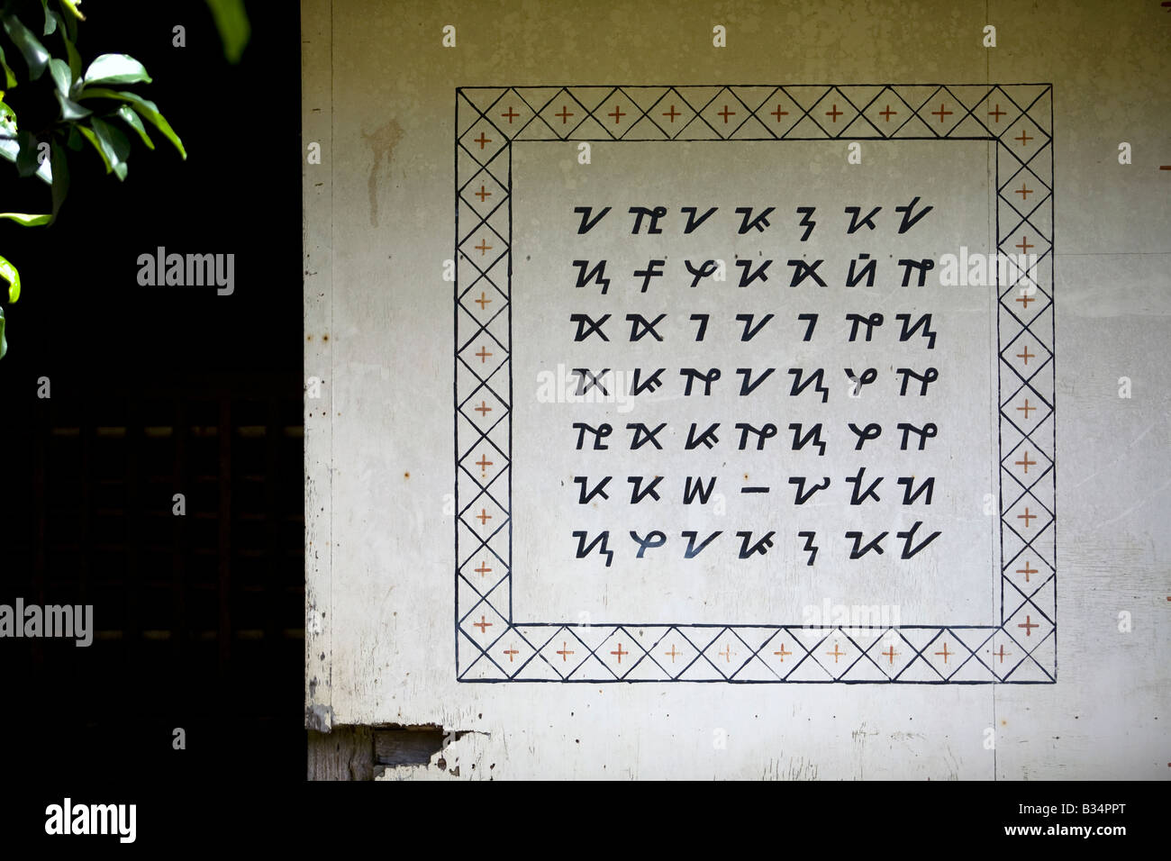 The Mangyan alphabet displayed on a church wall in the Mangyan ...