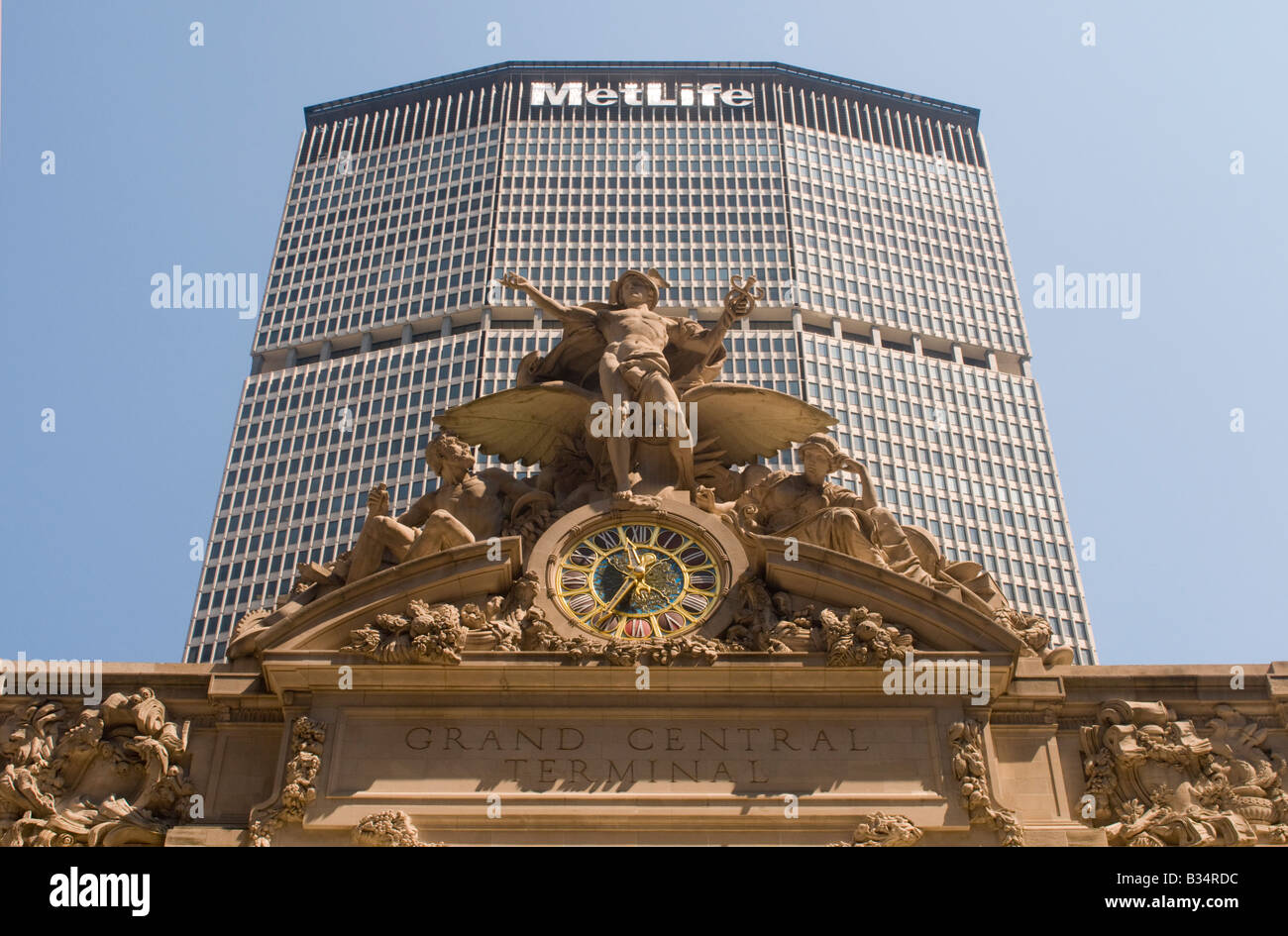 The Grand Central Clock against the MetLife Building on Park Avenue ...