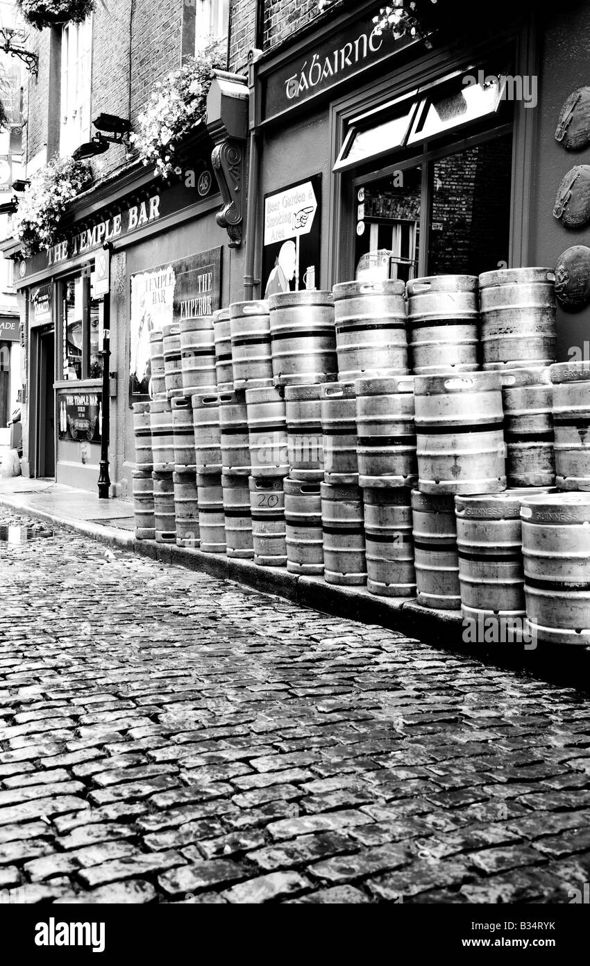 beer barrels on a cobbled street outside the Temple Bar pub Dublin ...