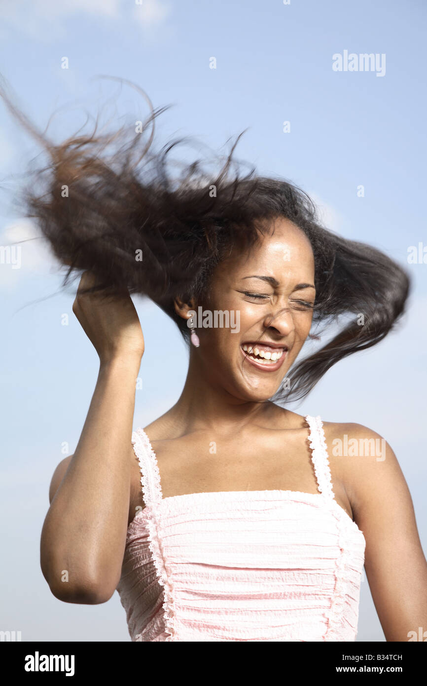 woman with blowing hair Stock Photo - Alamy
