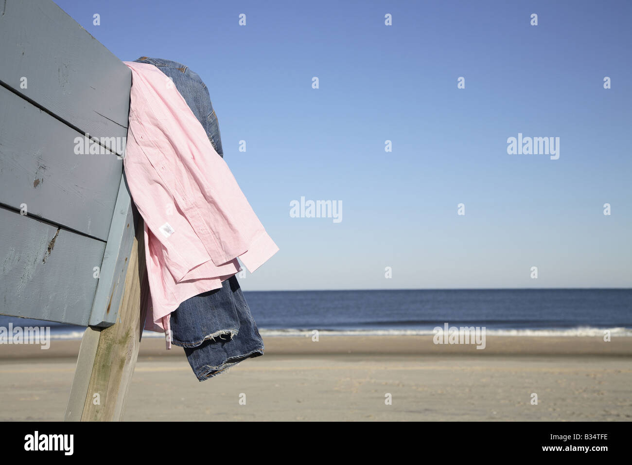 clothes on beach Stock Photo - Alamy
