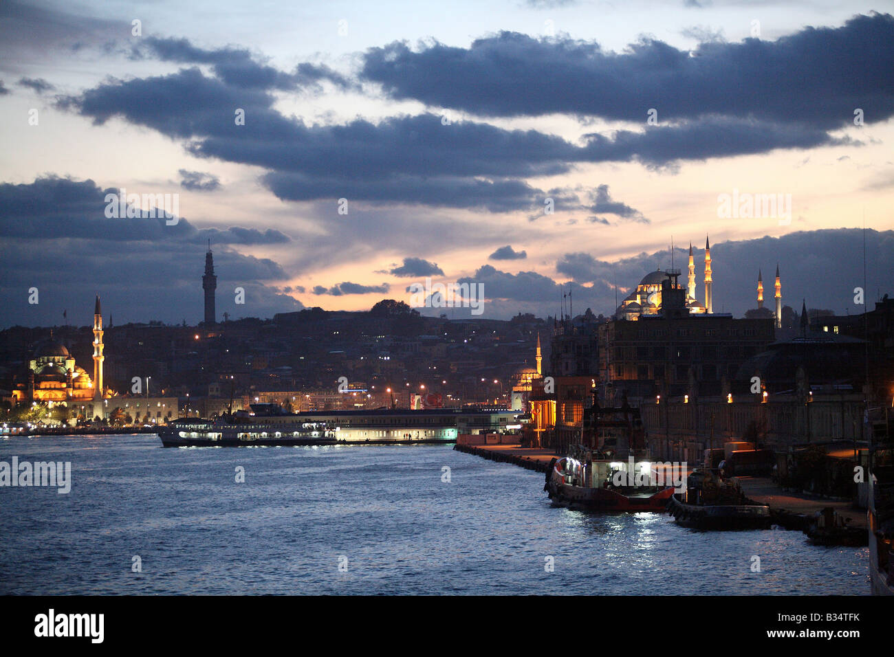 The harbour in Istanbul and the mosque in the sunset light, Turkey ...