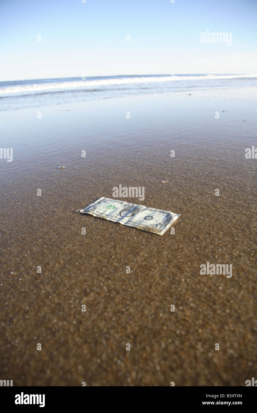 US one dollar bill in ocean Stock Photo - Alamy