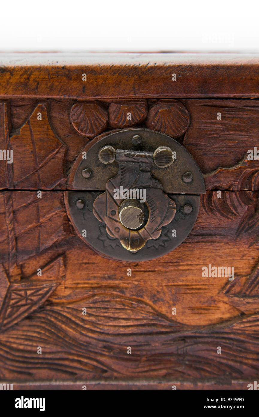 Decorative carved wooden box with latch, white background Stock Photo ...