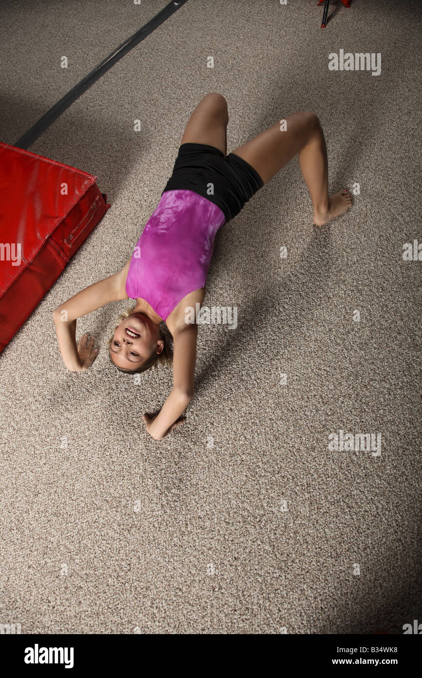 young female gymnast stretching Stock Photo - Alamy