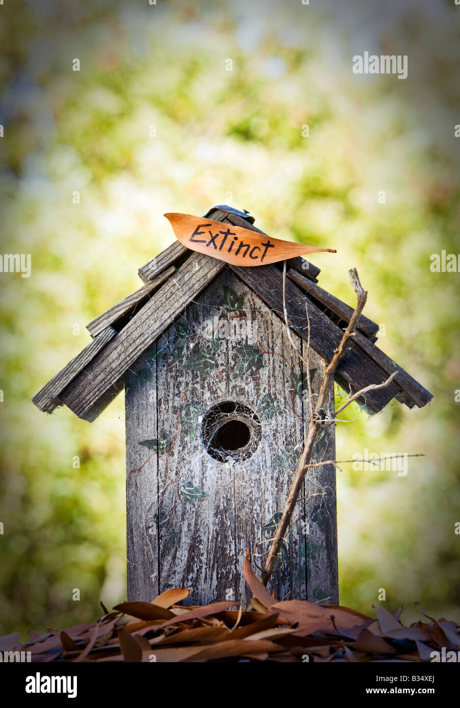 birdhouse with extinct sign Stock Photo - Alamy