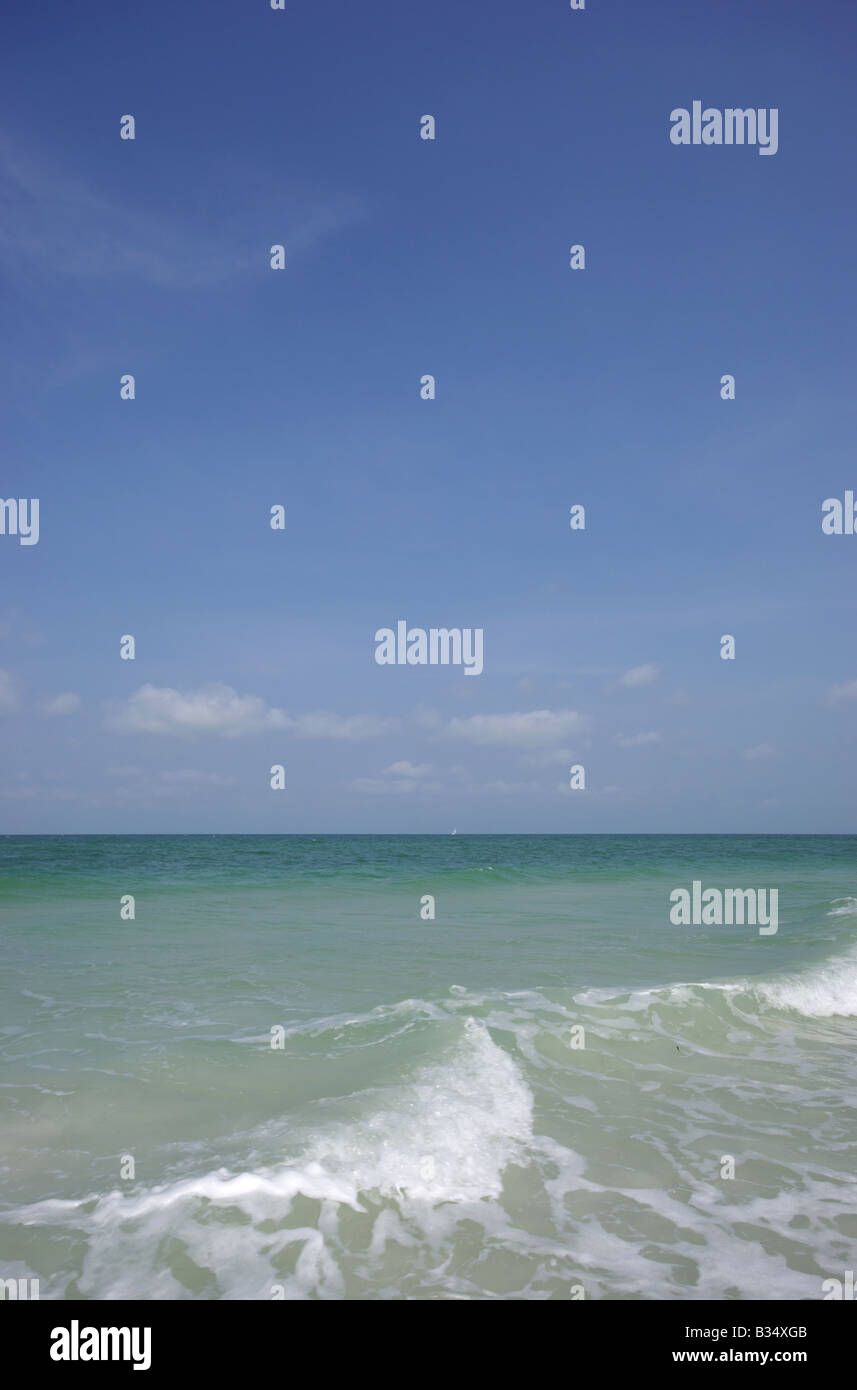 Surf and blue sky on a Florida beach Stock Photo - Alamy