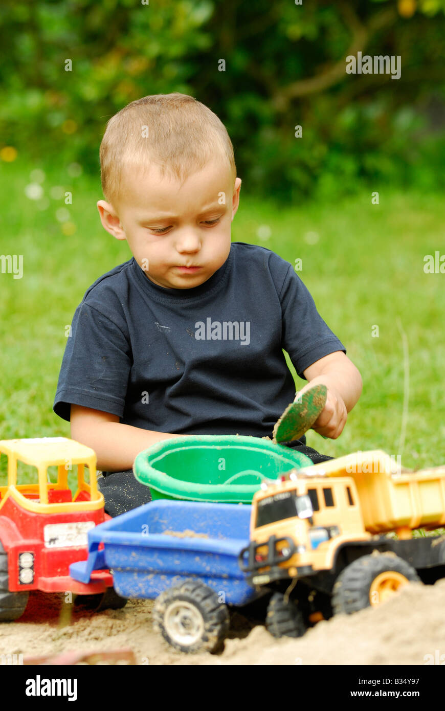 Baby boy boys in sand pit playing toys playground 1 2 years Stock Photo ...