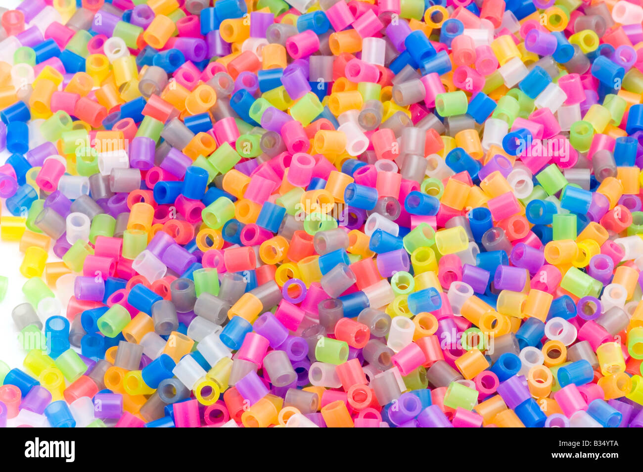 object on white toy color beads Stock Photo - Alamy